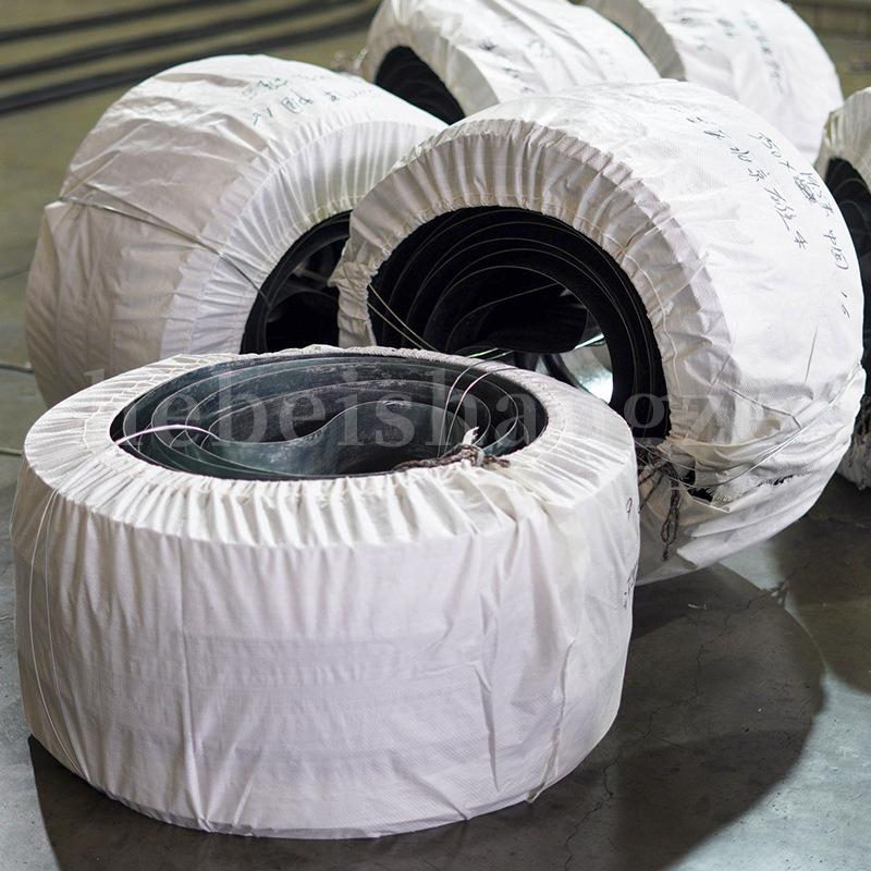 Manufacturer's embedded steel-edged rubber waterstop, externally ...